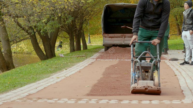 Compacting the Road Surface. Stock Footage - Video of sand, punch ...