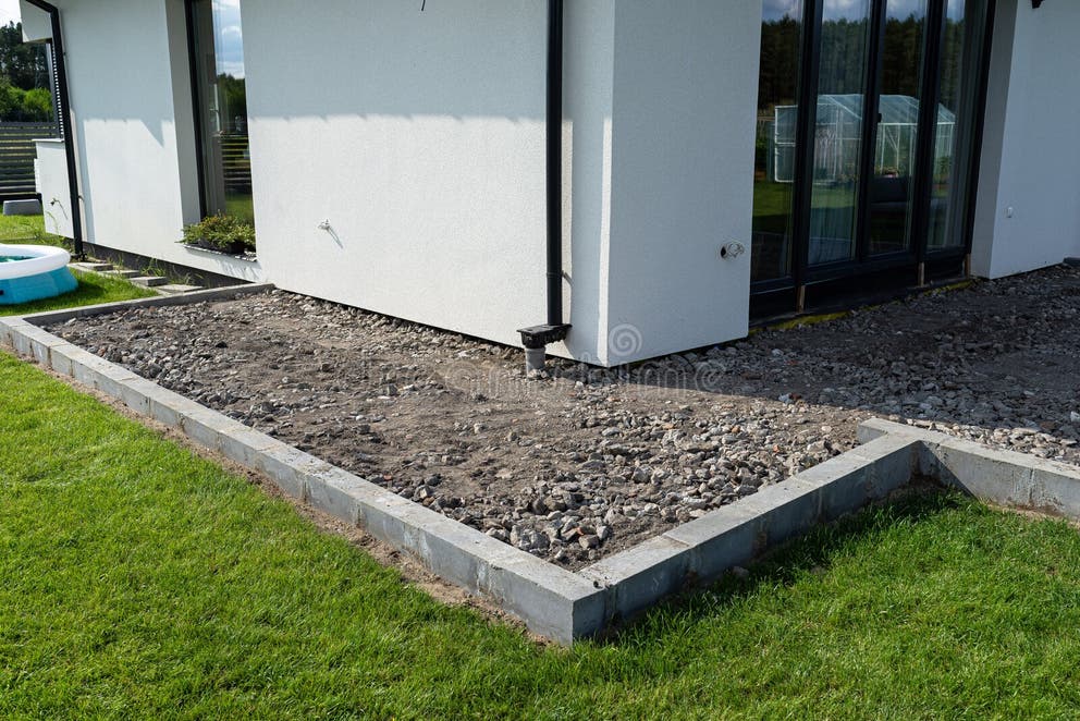 Compacting Rubble on a Terrace Under Construction Using a Gasoline ...