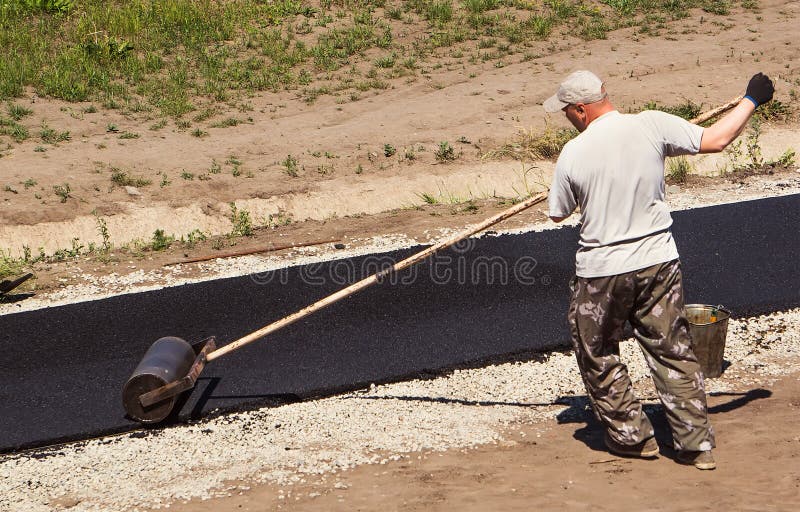 Compaction of Asphalt on a Path. Editorial Photography - Image of rink ...