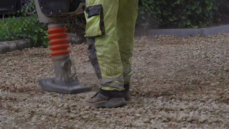 Compaction of Gravel Base Using a "foot" Compactor. Stock Footage ...