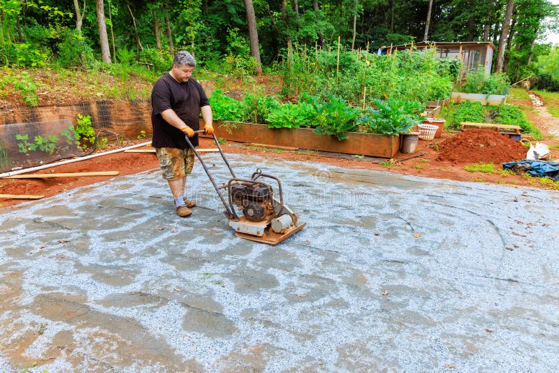 Compaction Sand Using Vibratory Tamping Machine during Construction of ...
