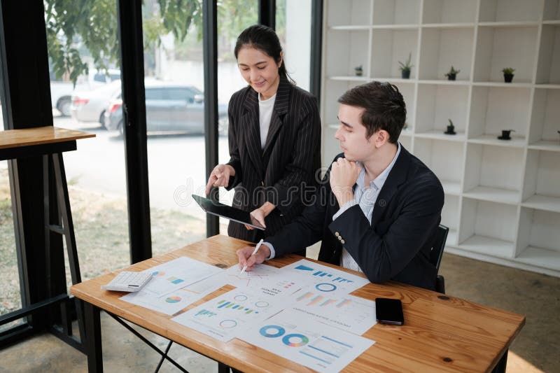 Company CEO and Top Manager Talking, Using Laptop Computer in Office ...