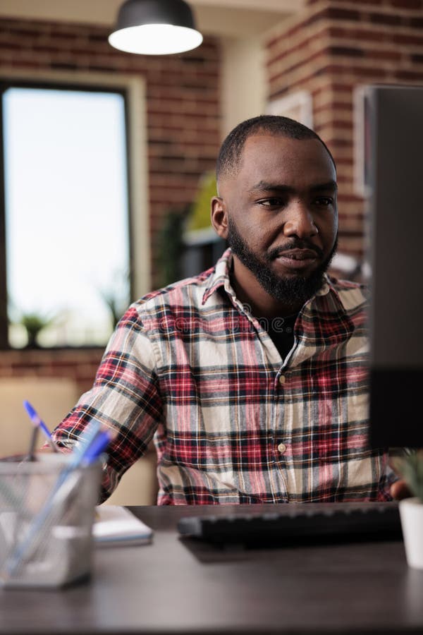Company Employee Working on Computer at Desk Stock Photo - Image of ...