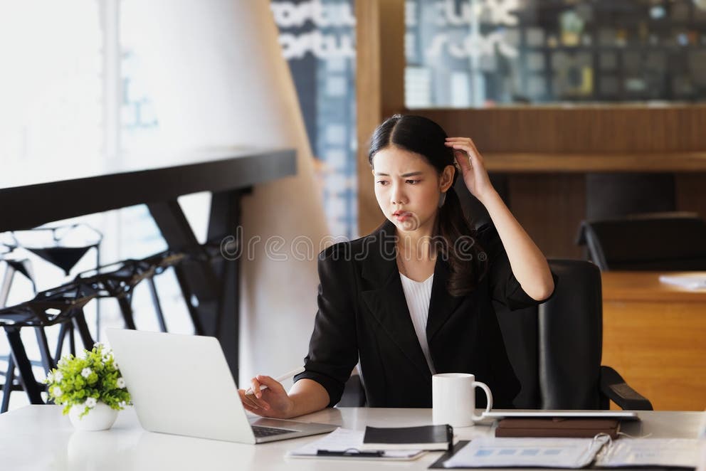 Company Employees Show Boredom from Unfinished Work Using Computer ...