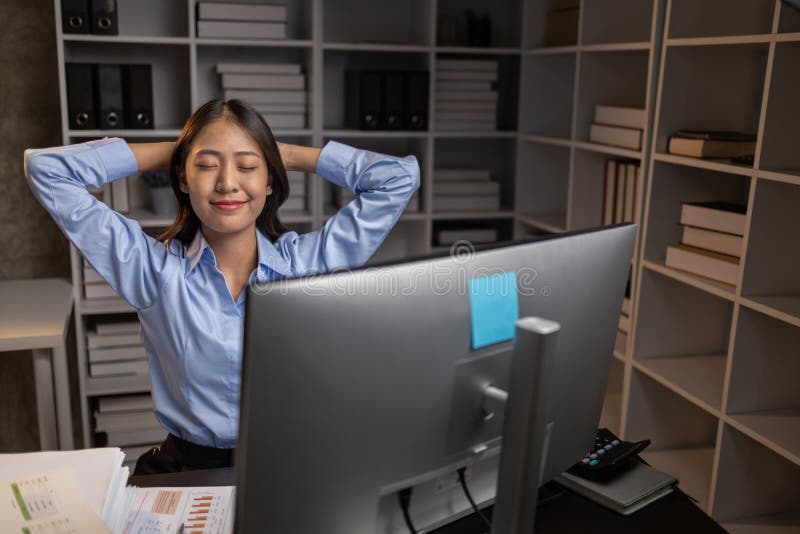 Company Employees Working Overtime after Work, Working Overtime after ... Company Employees Working Overtime after Work, Working Overtime after ...