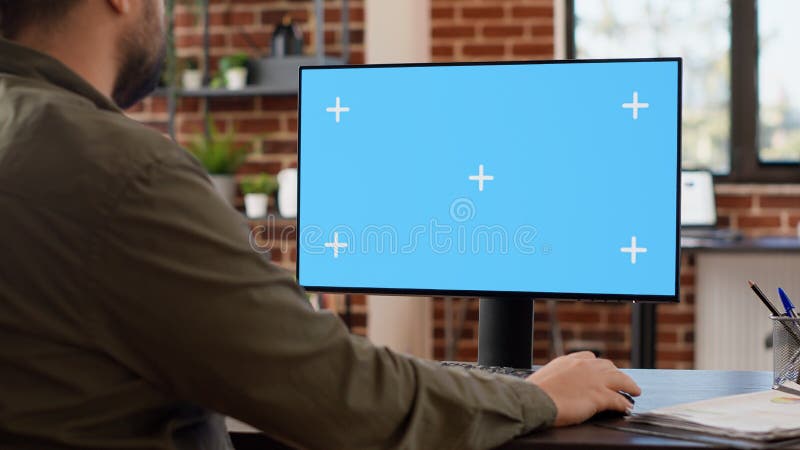 Company Manager Looking at Computer with Greenscreen Stock Image ...