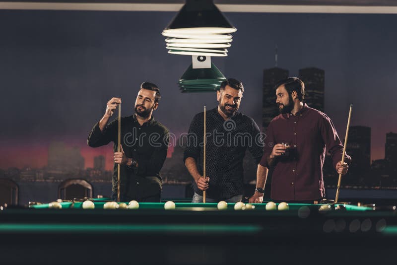 Company of Successful Handsome Men Standing beside Pool Table with ...