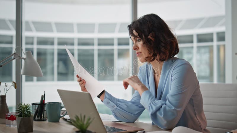 Company Worker Reading Document at Modern Workspace Closeup. Woman ...