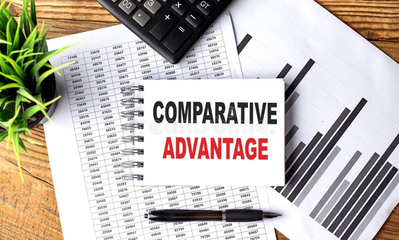 COMPARATIVE ADVANTAGE Text on Notebook on Chart with Calculator and Pen ...