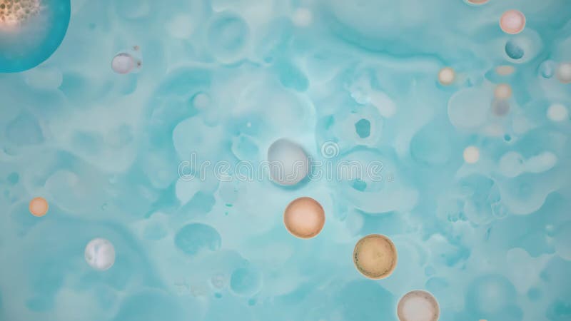 Comparing Different Water Particles in a Blue Liquid at Various ...