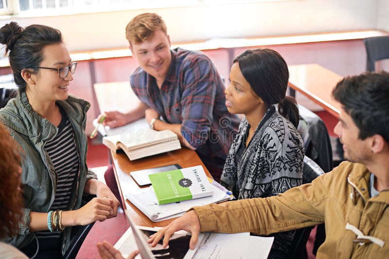 Comparing Notes after Class. Overhead Shot of Students Hanging Out ...