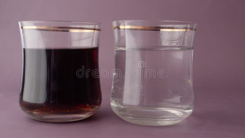 Comparing Soft Drinks with Glass of Water on Table Stock Video - Video ...