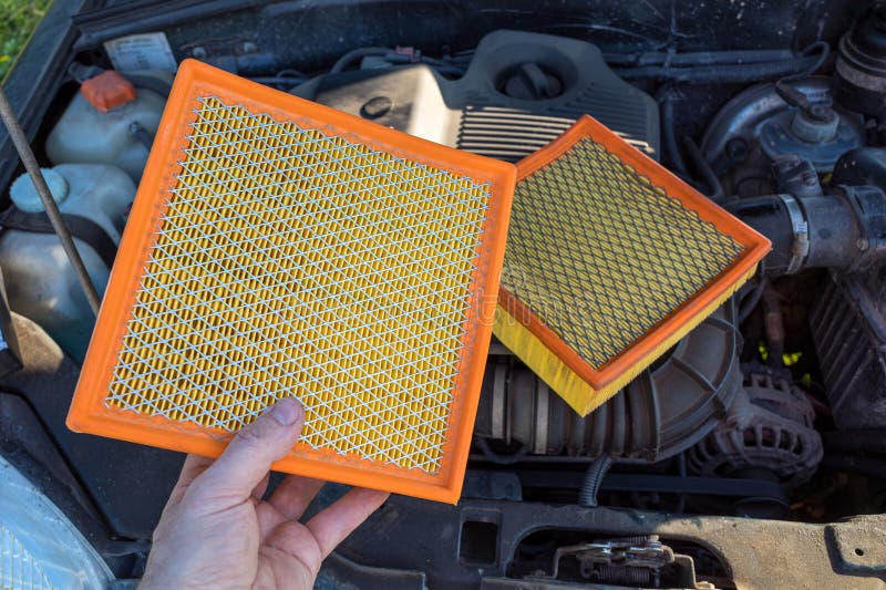 Comparison of a New and Used Air Filter for a Car Engine, Car ...