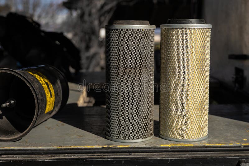 Comparison of Old and New Air Filter of a Truck or Van. Metal Mesh ...