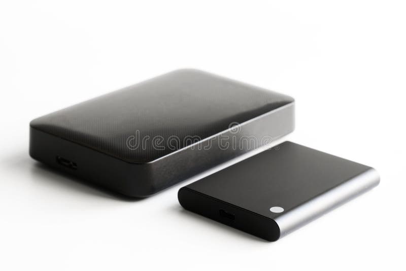 Comparison of Sizes of External SSD and External HDD. Computer Digital ...