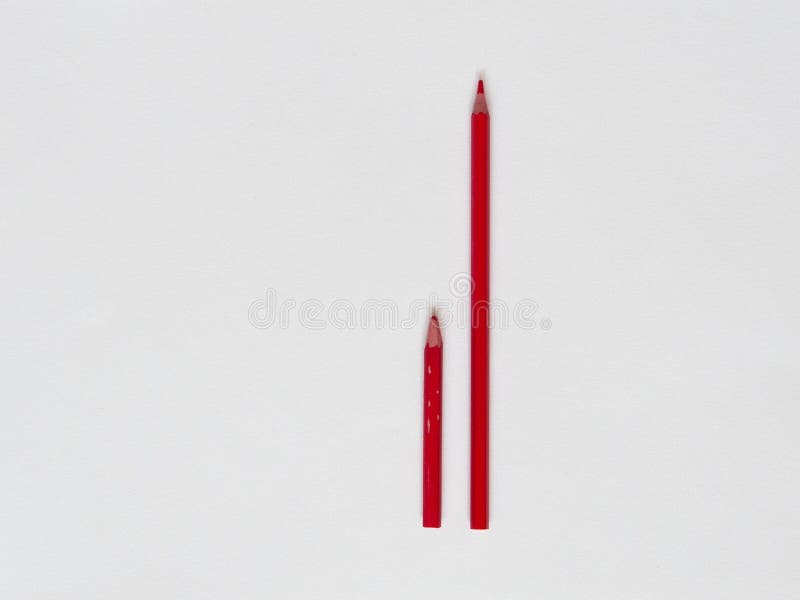 Comparison of Two Red Pencils Stock Image - Image of experienced, style ...