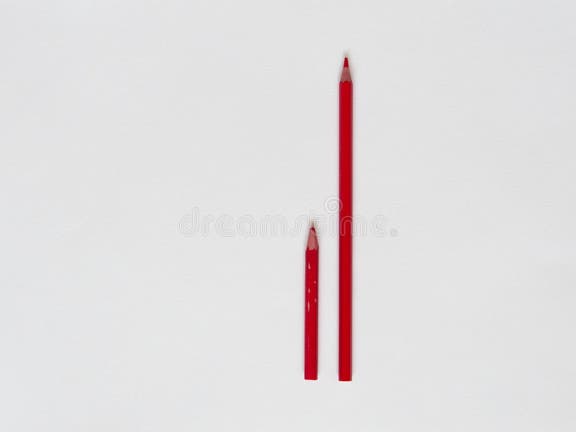 Comparison of Two Red Pencils Stock Image - Image of experienced, style ...