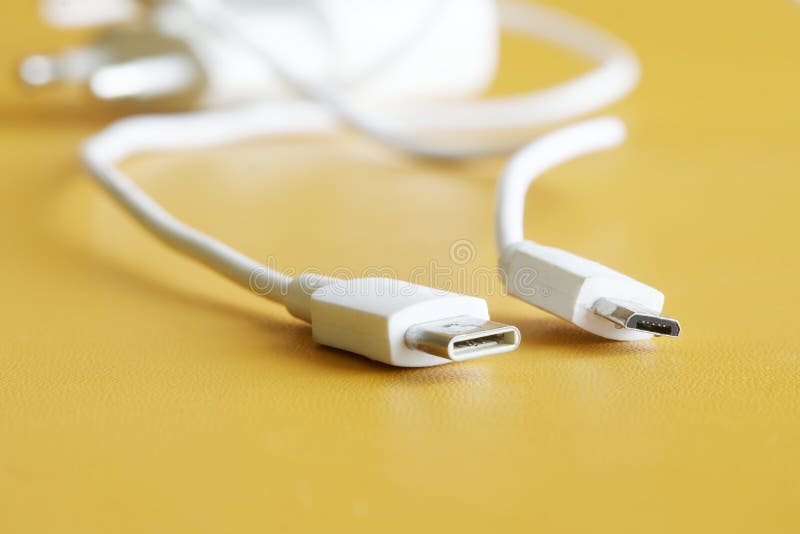 Comparison of USB Connectors. Micro USB and Type-C. Yellow Background ...