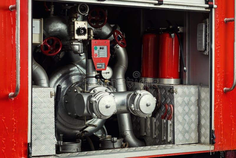 Compartment of Rolled Up Fire Hoses on a Fireengine. Emergency S Stock ...