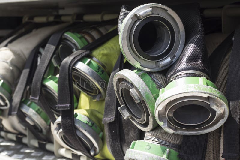 Compartment of Rolled Up Fire Hoses on a Fire Truck. Stock Photo ...