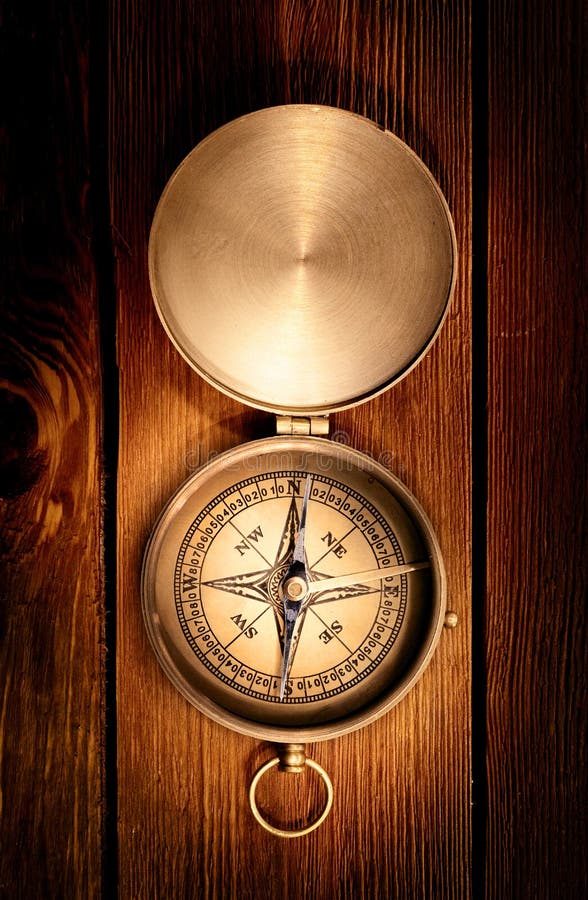 Antique brass compass stock image. Image of isolated, north - 1624275