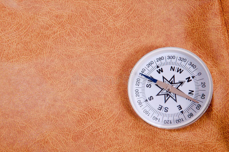 Compass against the skin stock photo. Image of north - 20049924