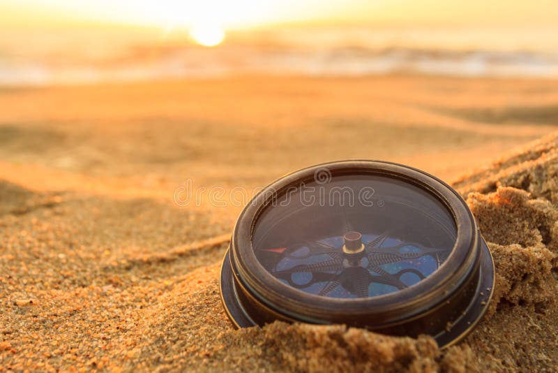 Compass on the Beach with Sand and Sea Stock Image - Image of adventure ...