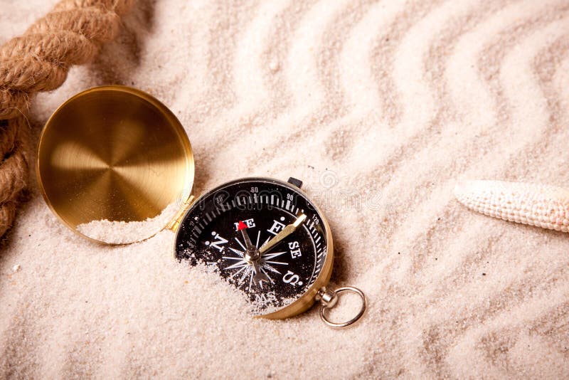 Compass on beach stock image. Image of leisure, marine - 14569137