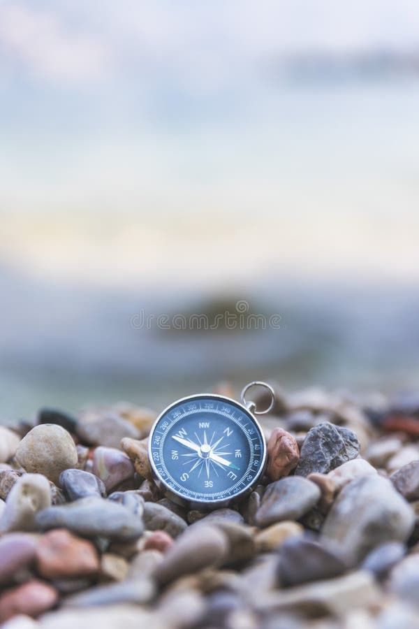 Compass on the Beach, Small Stones, Text Space Stock Image - Image of ...