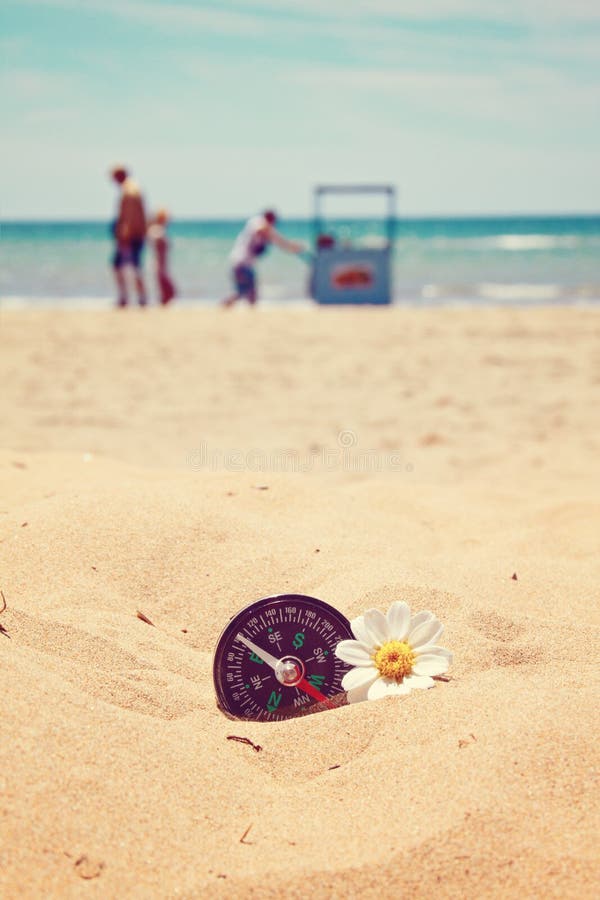 Compass On The Beach With Sand And Sea Stock Image - Image of adventure ...