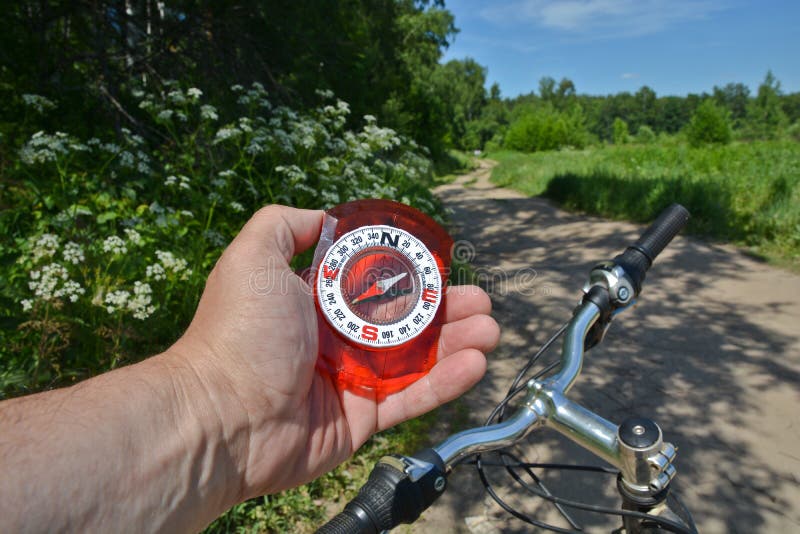 Compass and bike. stock image. Image of nature, finding - 61469147