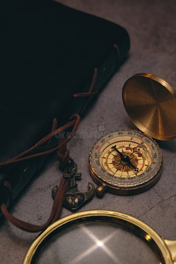 Compass, Book, and Magnifying Glass Stock Image - Image of compass ...