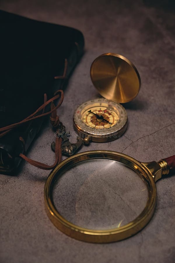 Compass, Book, and Magnifying Glass Stock Image - Image of closeup ...