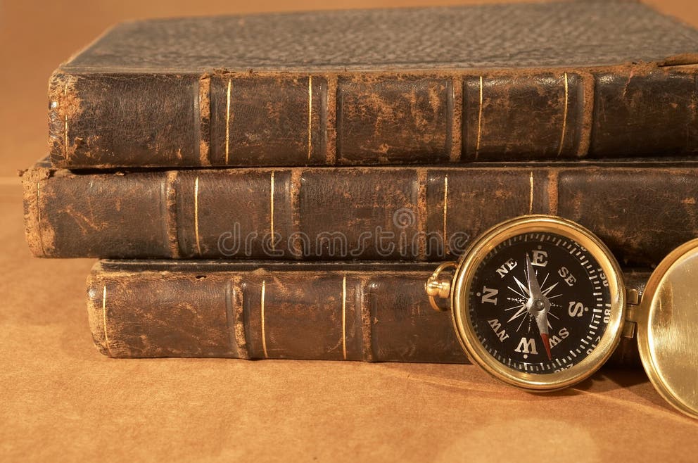 Compass and books stock image. Image of direction, system - 2417171