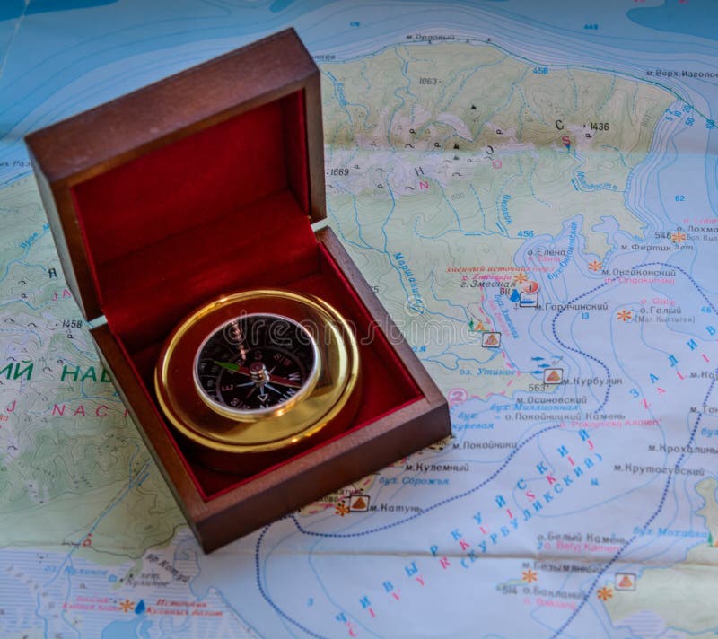 Compass in a Box on the Map Stock Photo - Image of holiday, north ...