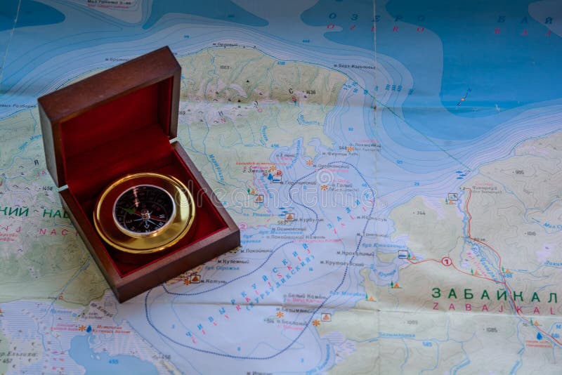 Compass in a Box on the Map Stock Photo - Image of metal, east: 104828770