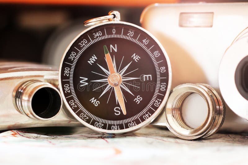 Compass and a Camera on the Map Stock Photo - Image of distance, dolly ...