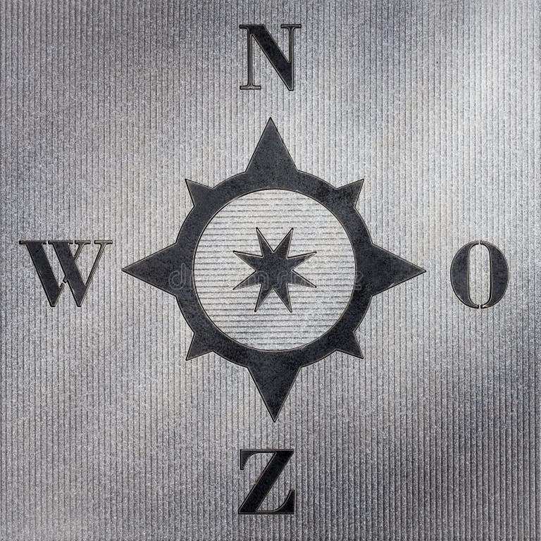 Compass card cut in stone stock photo. Image of artistic - 28944150