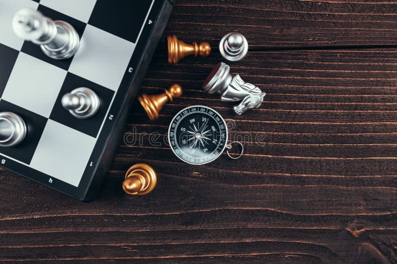 Compass and Chess Piece on Chess Board Game for Ideas, Challenge ...