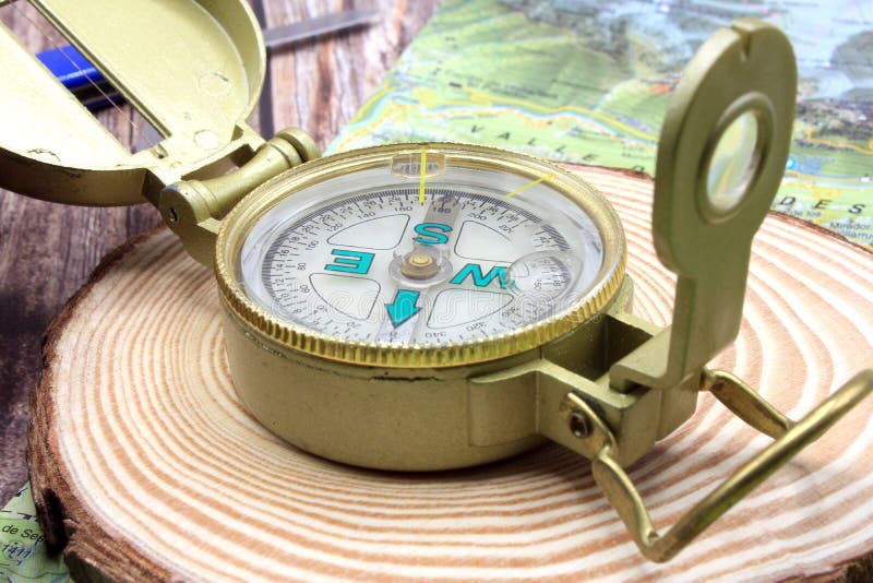 Compass on a cut log stock image. Image of compass, wood - 219428327