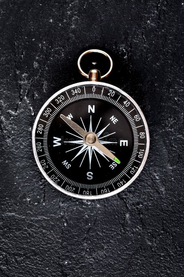 Compass on Dark Background Concept - Direction Motion Top View Stock ...