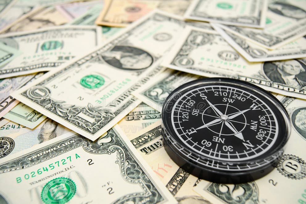Compass on the dollars. stock image. Image of business - 33723363