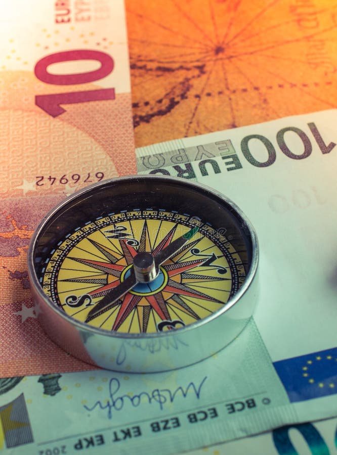 Compass and Euro Banknotes on an Old Map Stock Photo - Image of magnet ...