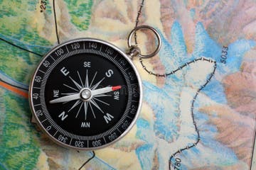 Compass on geography map stock image. Image of journey - 14506333