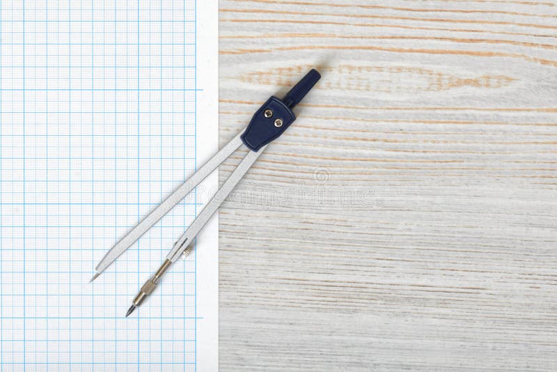 Compass on Graph Paper in Top View with Copy Space Stock Photo - Image ...
