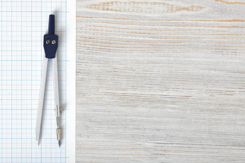 Compass on Graph Paper in Top View with Copy Space Stock Photo - Image ...