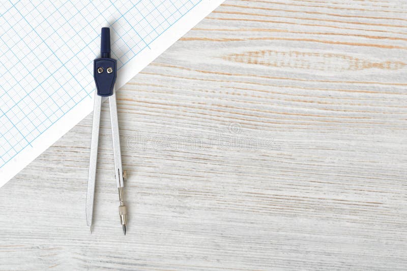 Compass on Graph Paper in Top View with Copy Space Stock Photo - Image ...