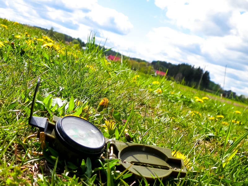 Compass on Grass - Traveling, Exploration and Navigation Stock Image ...