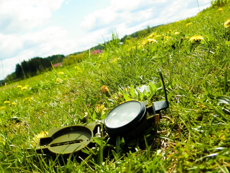 Compass on Grass - Traveling, Exploration and Navigation Stock Image ...