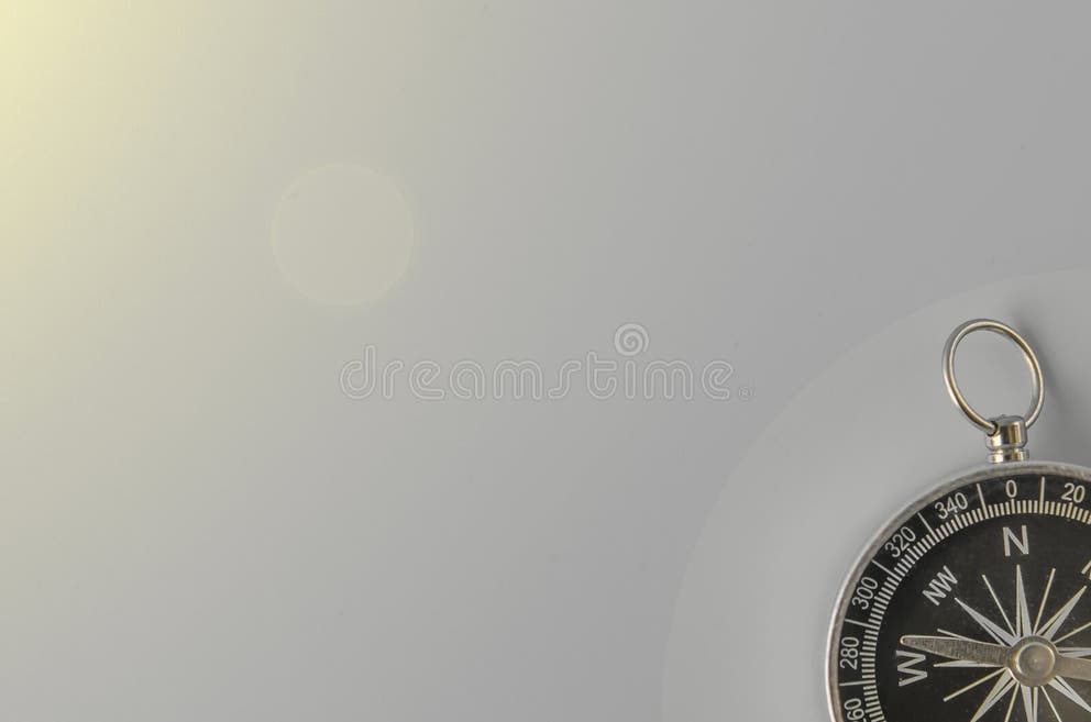 Compass on gray background stock photo. Image of arrow - 111923296